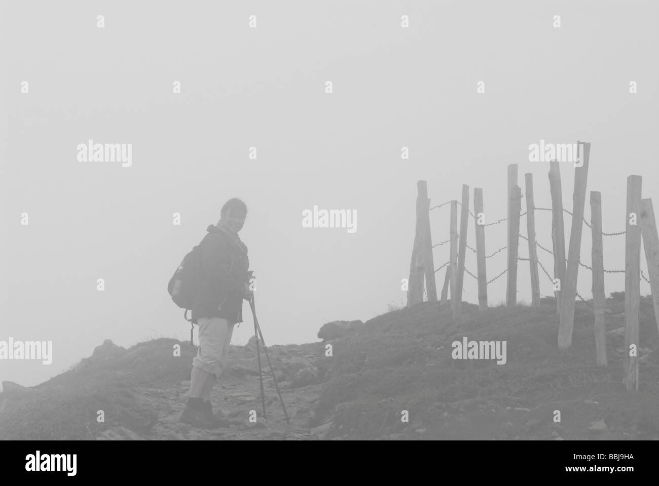 Low visibility on the way to the summit Stock Photo - Alamy