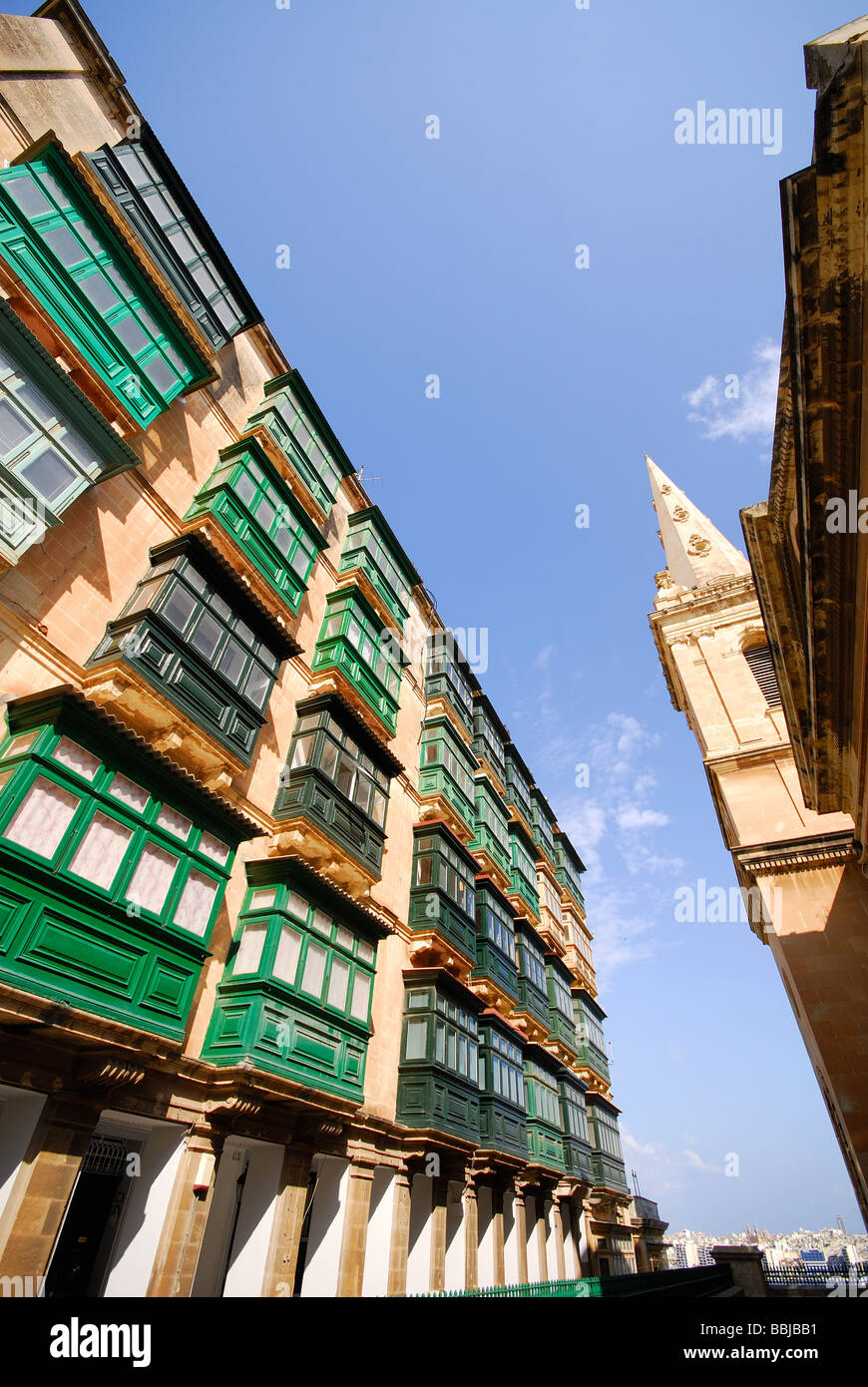 MALTA. Residential buildings on Triq il-Punent in Valletta, with St ...