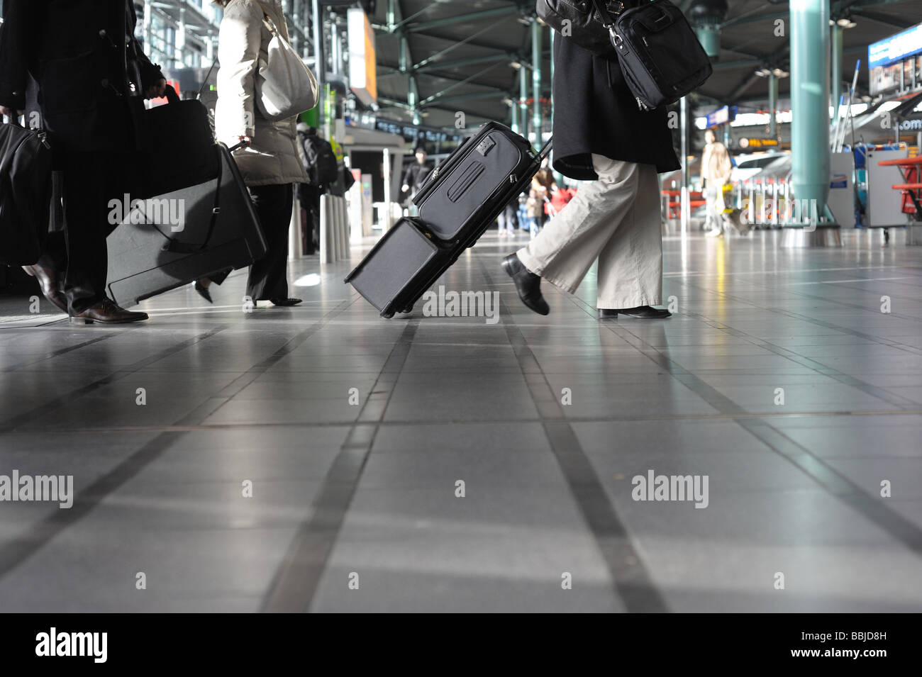people traveling at the airport Stock Photo - Alamy