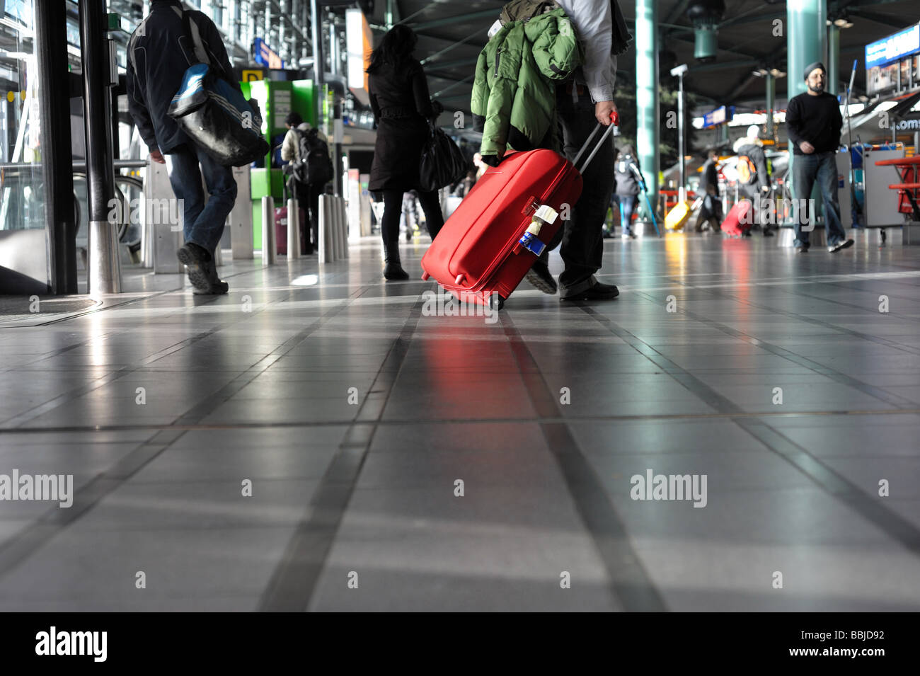 people traveling at the airport Stock Photo - Alamy