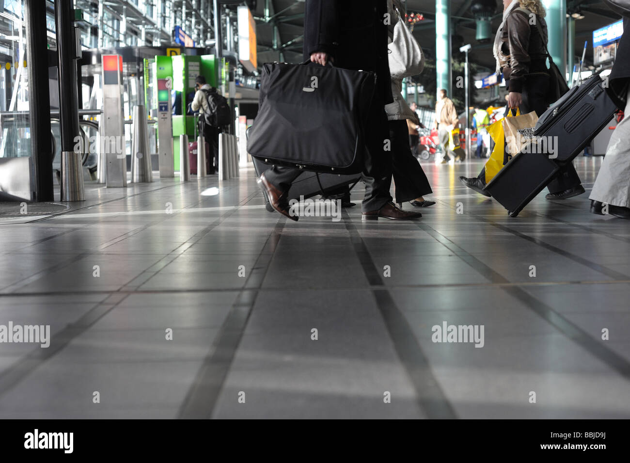 people traveling at the airport Stock Photo - Alamy