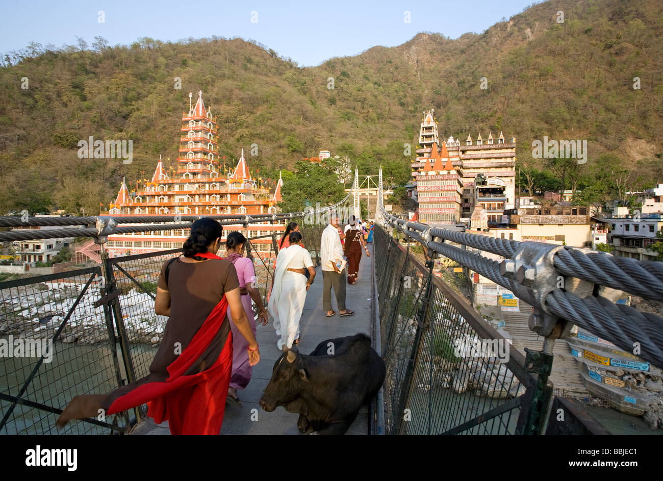Pedestrians crossing Lakshman Jhula bridge. Rishikesh. Uttarakhand ...