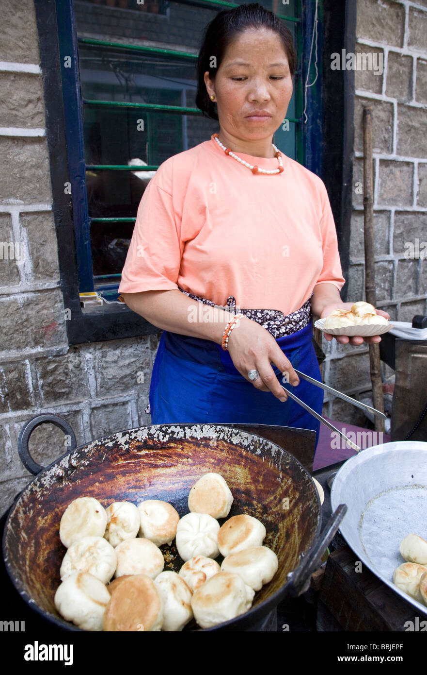 Tibetan woman frying momos. McLeod Ganj. Dharamsala. Himachal Pradesh ...