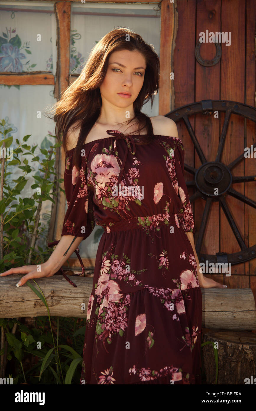 Beautiful rural girl near the dwelling Stock Photo - Alamy