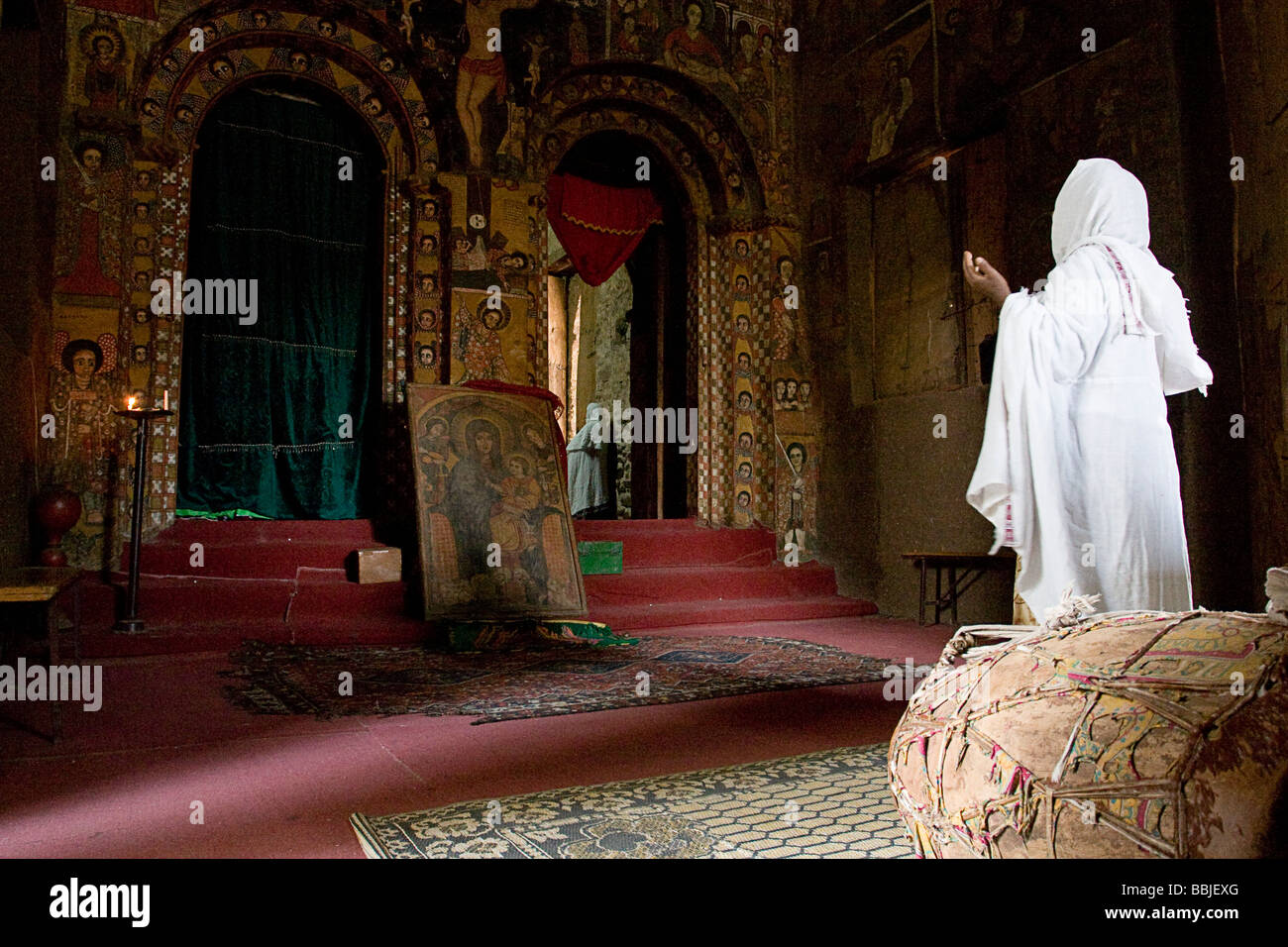 Ethiopia; Woman praying inside church Stock Photo - Alamy