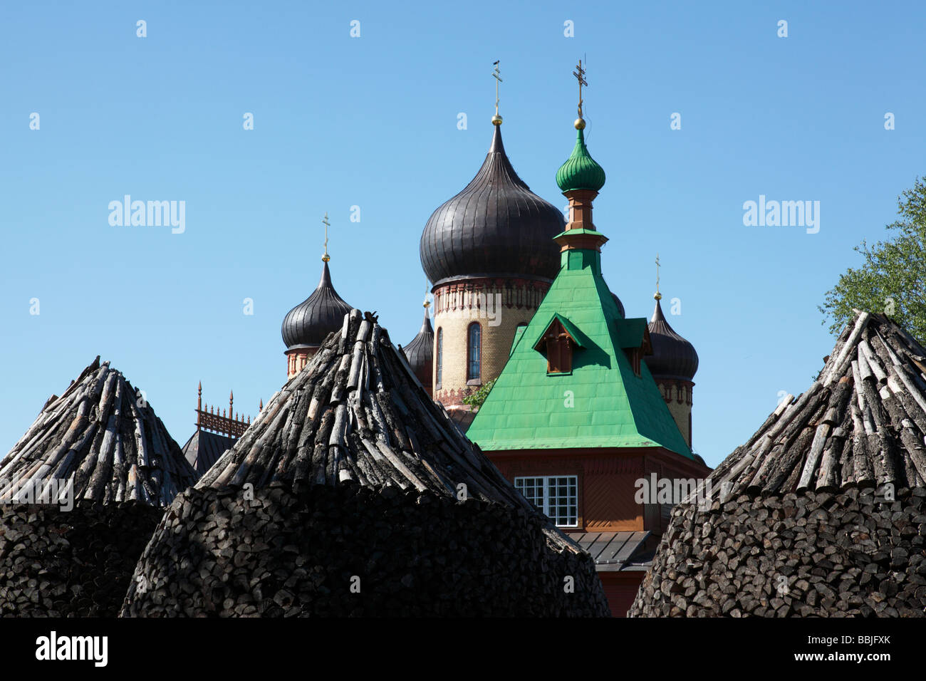 stack of firewood nuns russian orthodox monastery Puehtitsa in Northern ...