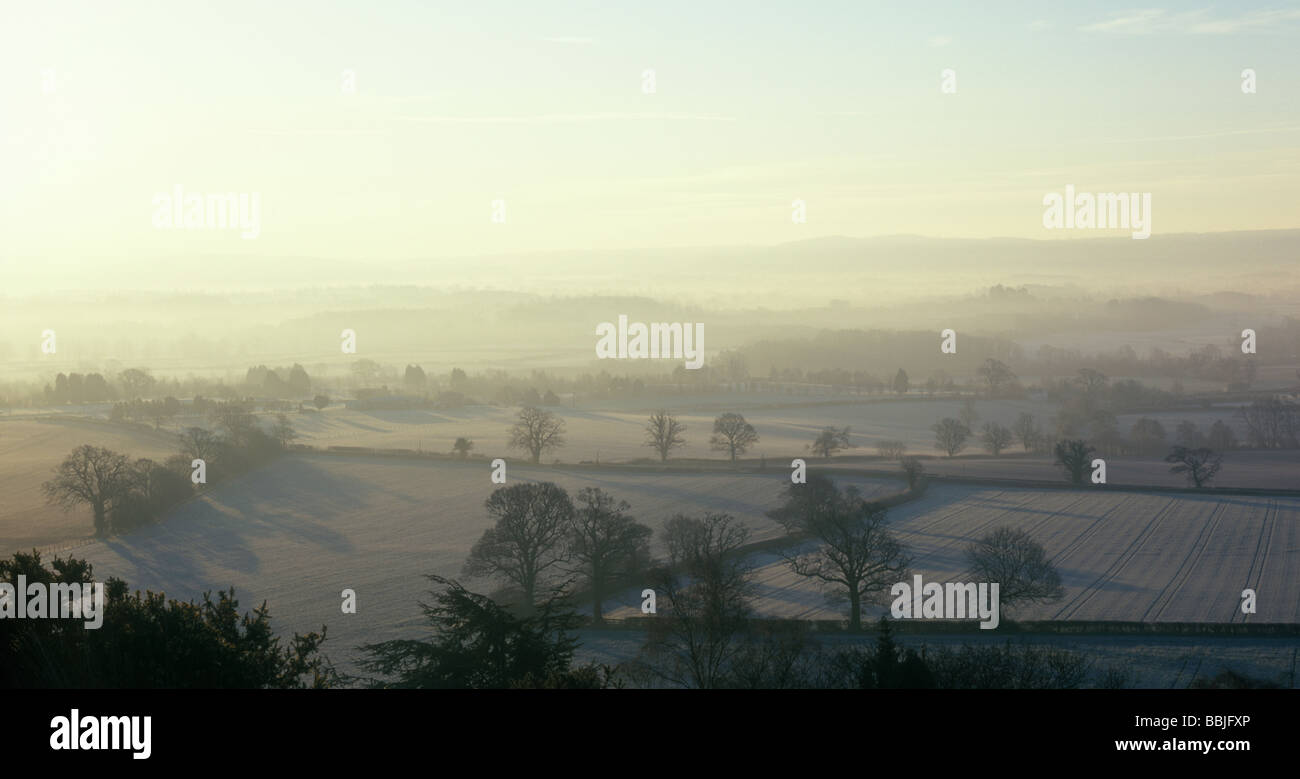 Winter frost and mist in the stunning countryside of Shropshire. View ...