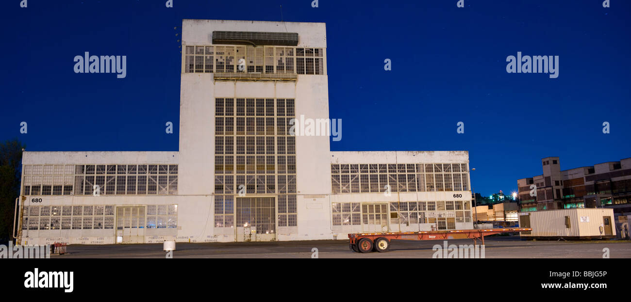 Big abandoned building near shipyard Stock Photo - Alamy