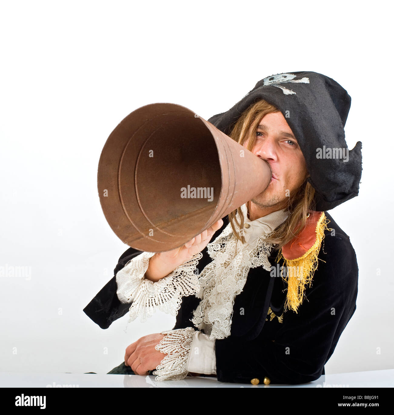 pirate shouting in old megaphone isolated on white Stock Photo - Alamy