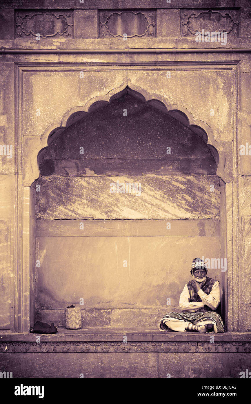 Old Man Sitting Under High Resolution Stock Photography and Images - Alamy