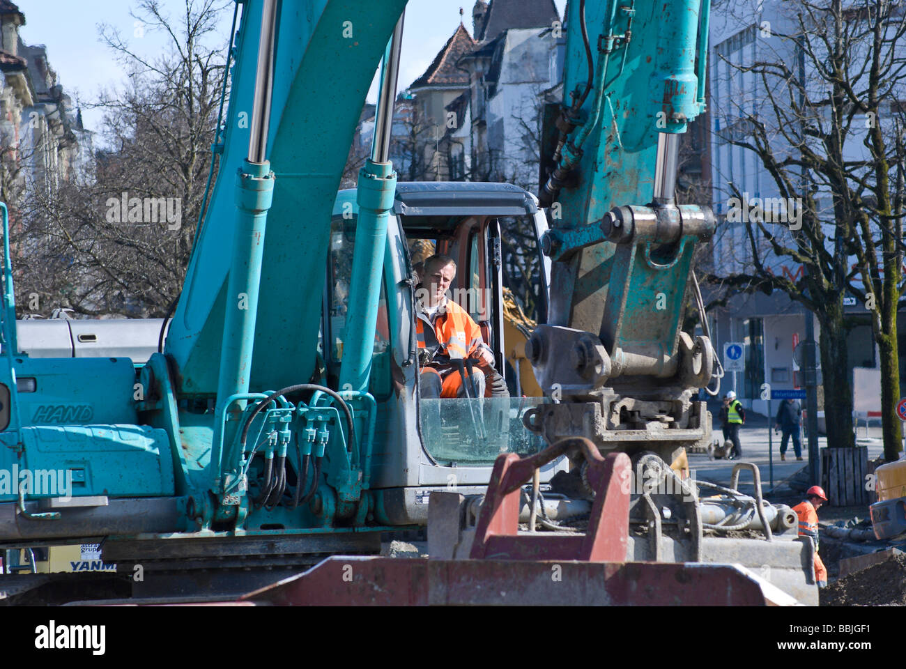 Heavy equipment operator working on road infrastructure project, Bern ...