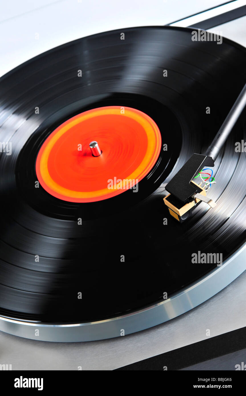 Vinyl record spinning on turntable close up Stock Photo - Alamy