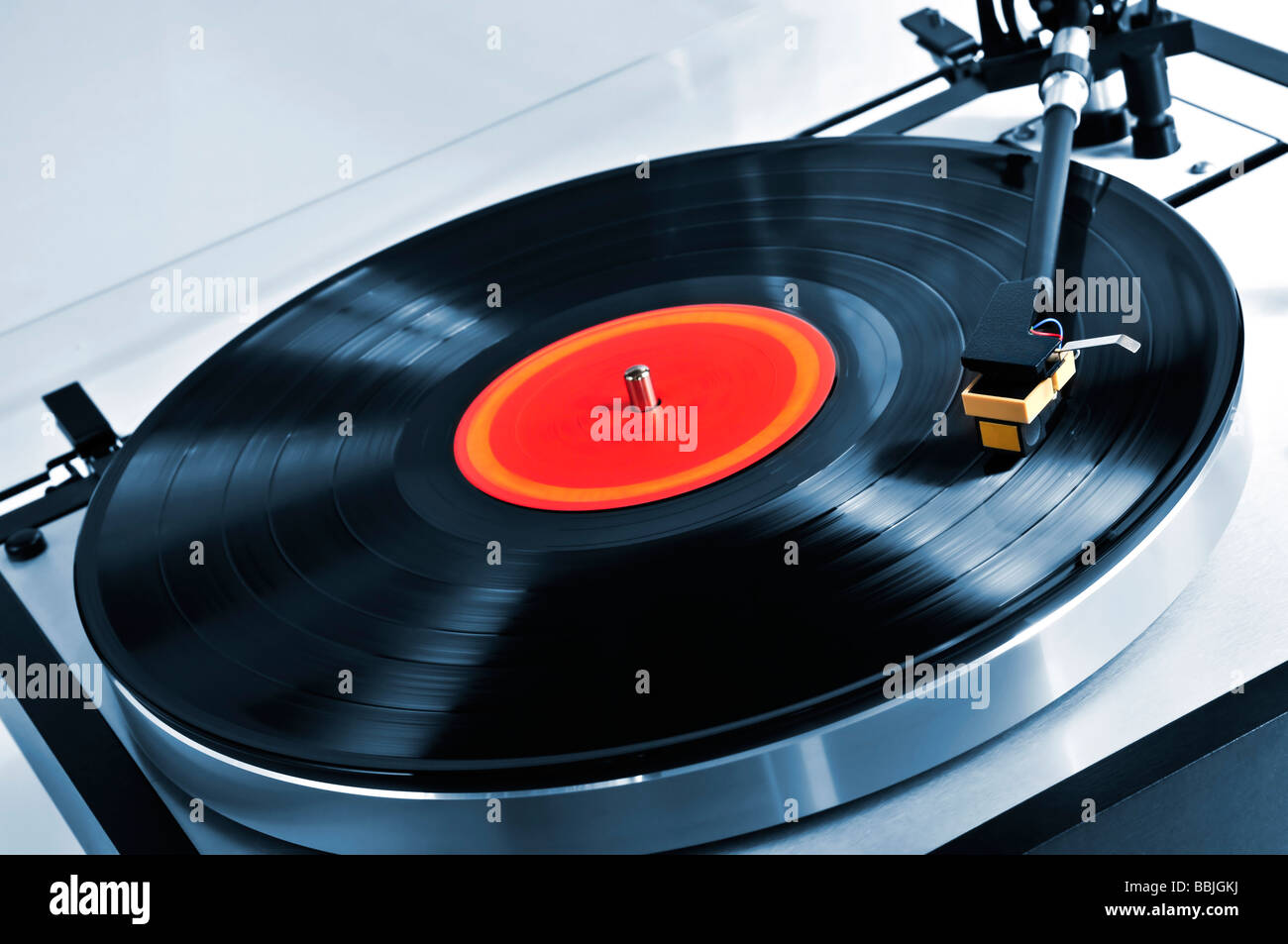 Vinyl record spinning on turntable close up Stock Photo - Alamy