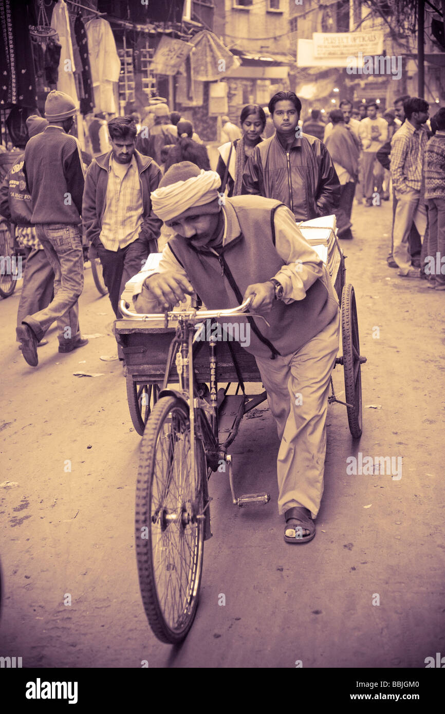 Indian man bicycle in street delhi hi-res stock photography and images ...