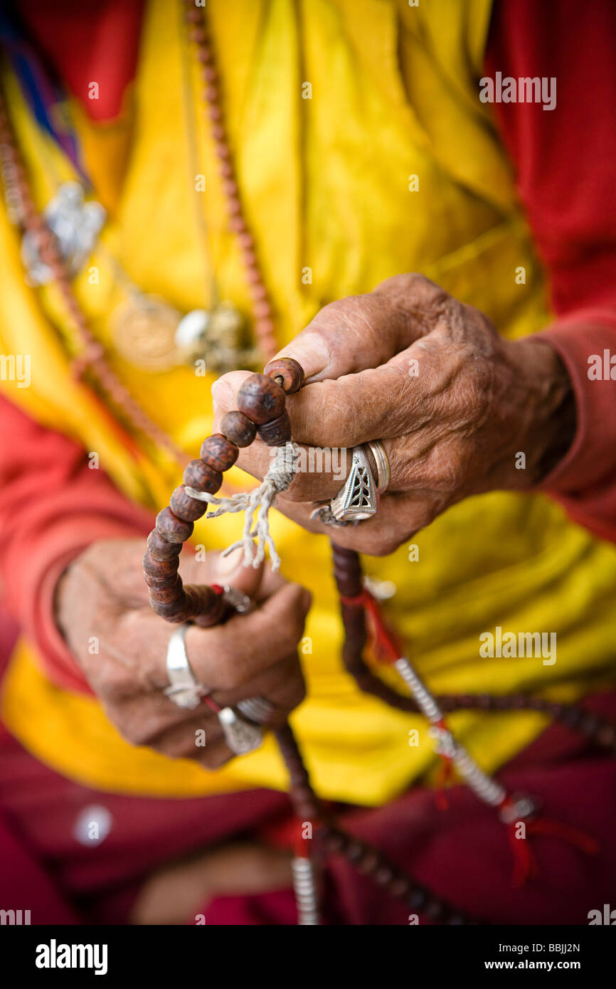 Monk Holding Prayer Beads High Resolution Stock Photography and Images ...