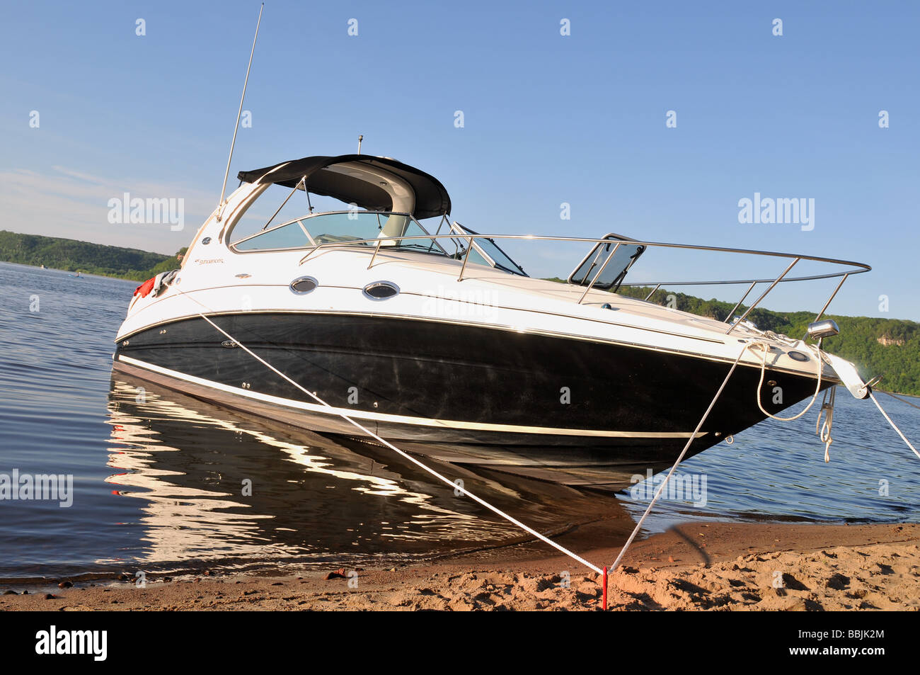 Anchored boat side view Stock Photo - Alamy