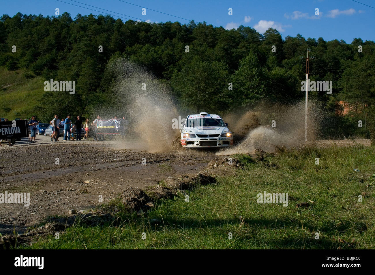 Race car takes the turn Stock Photo - Alamy