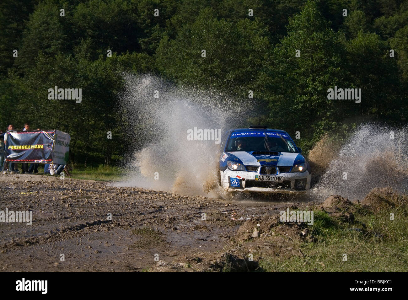 Race car takes the turn Stock Photo - Alamy
