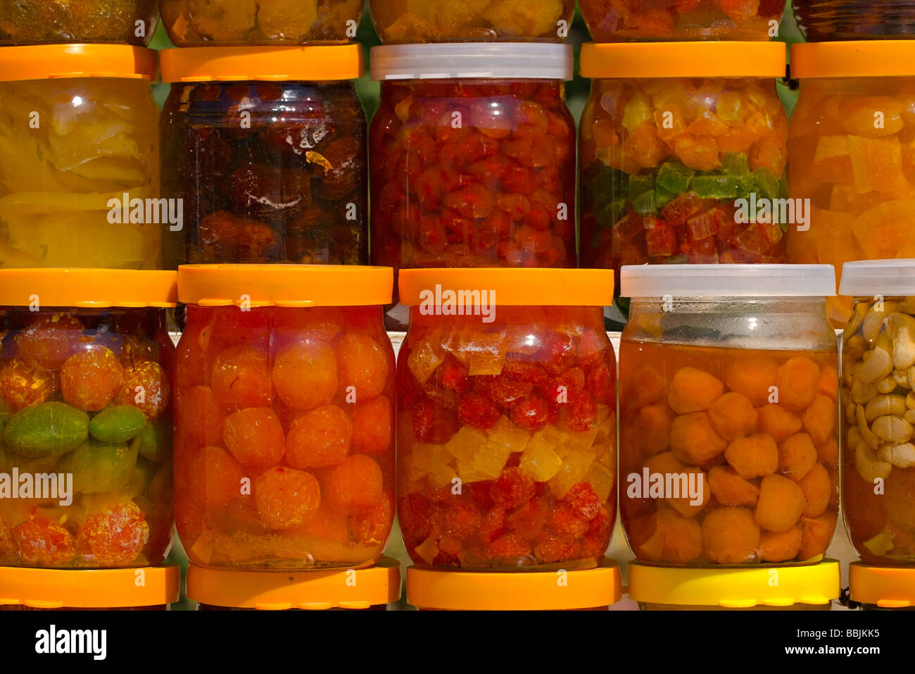 a lot of jars with assorted canned fruits Stock Photo - Alamy