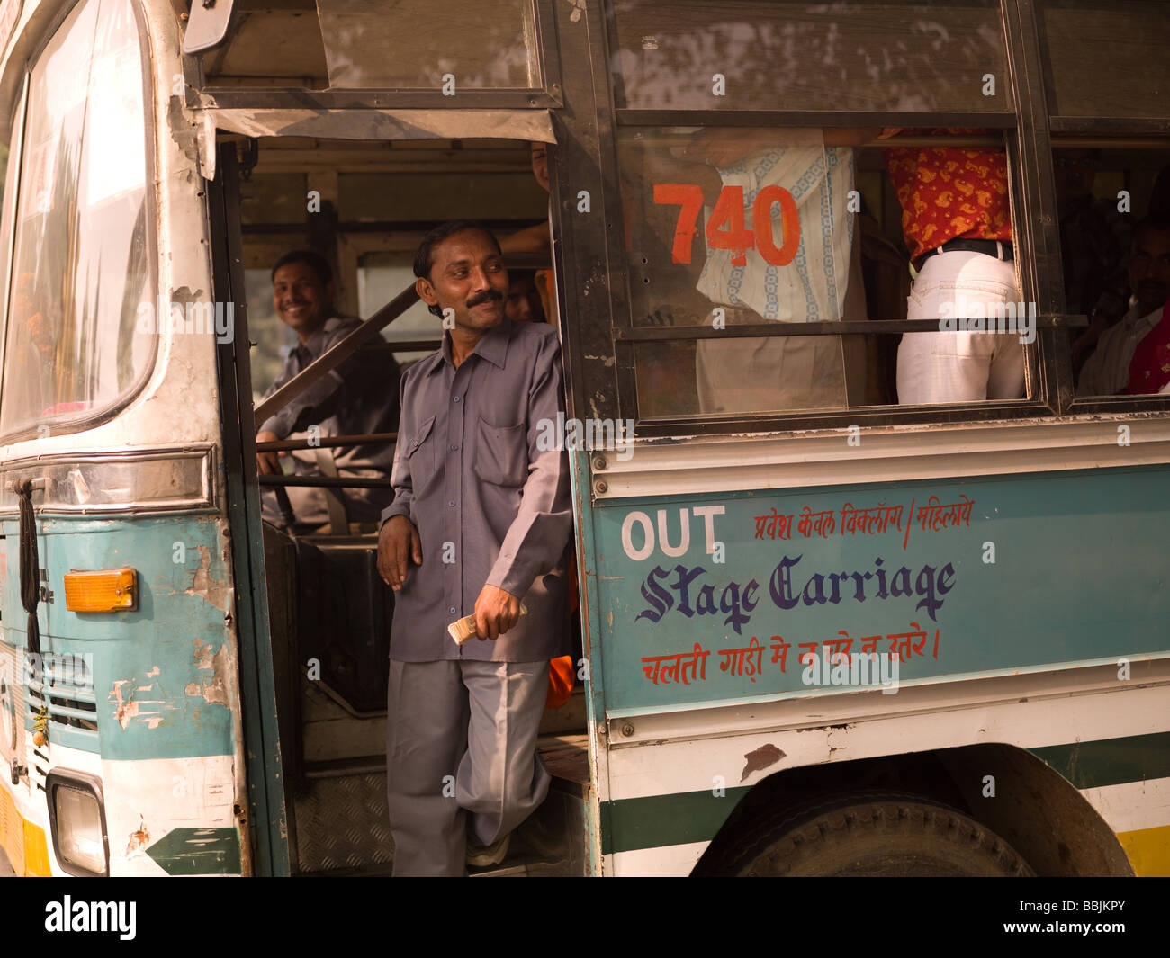 Man on a bus in India Stock Photo - Alamy