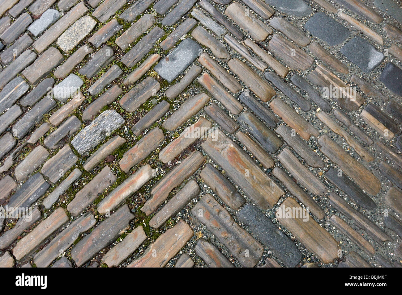 pattern of the old cobbled pavement Stock Photo - Alamy