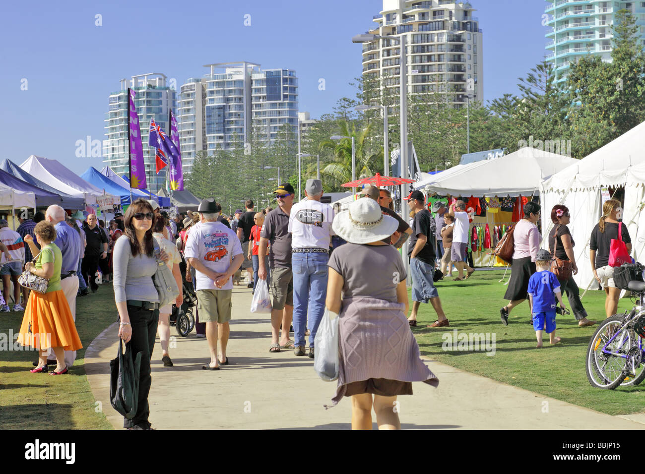 Crowds touring beachside fair with hot rod theme Stock Photo - Alamy