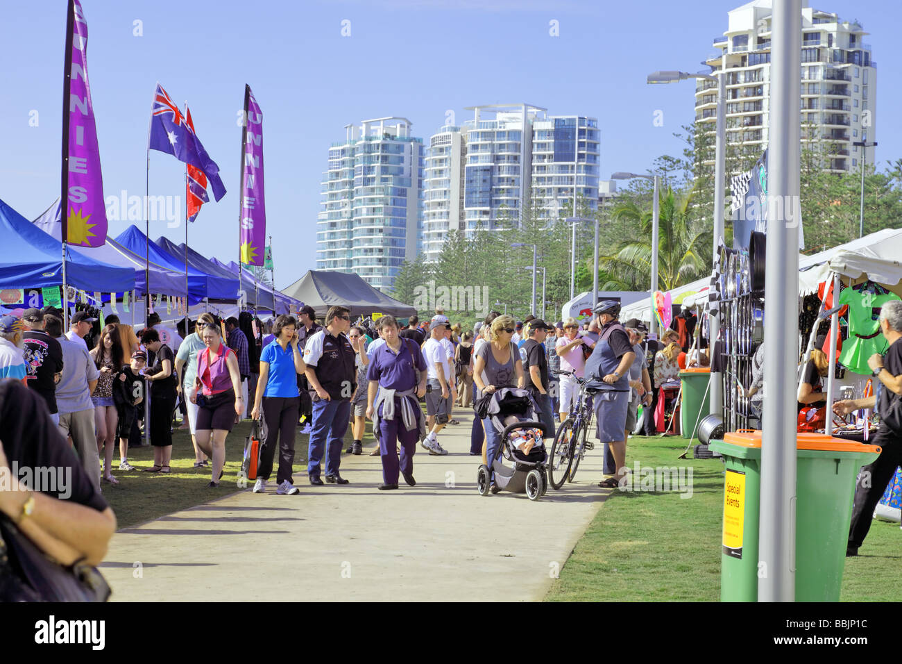 Crowds touring beachside fair with hot rod theme Stock Photo - Alamy