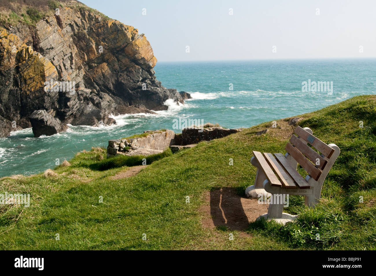 A bench on the cliffs Stock Photo - Alamy