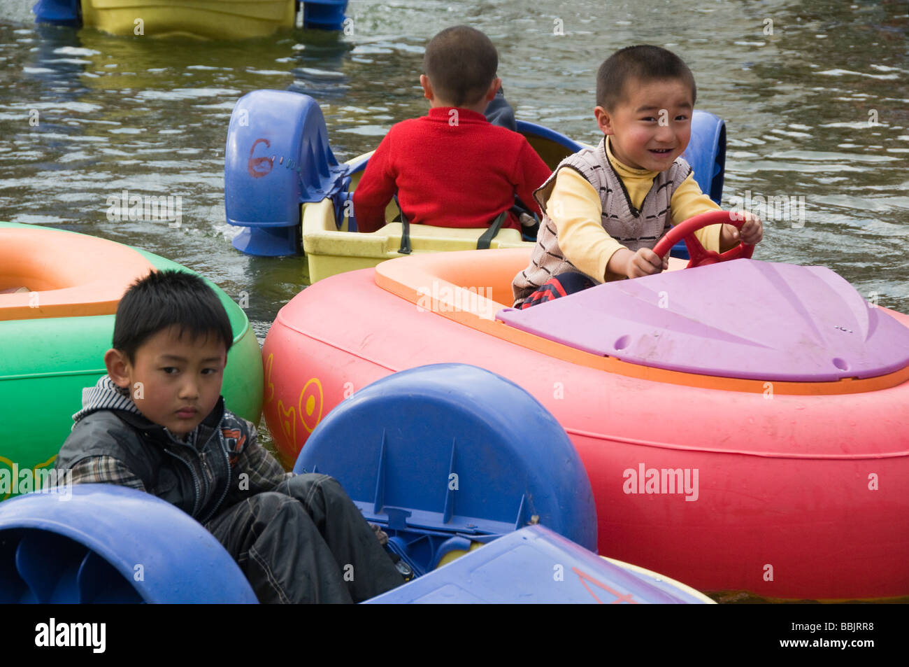Chinese children playing on boat hi-res stock photography and images ...