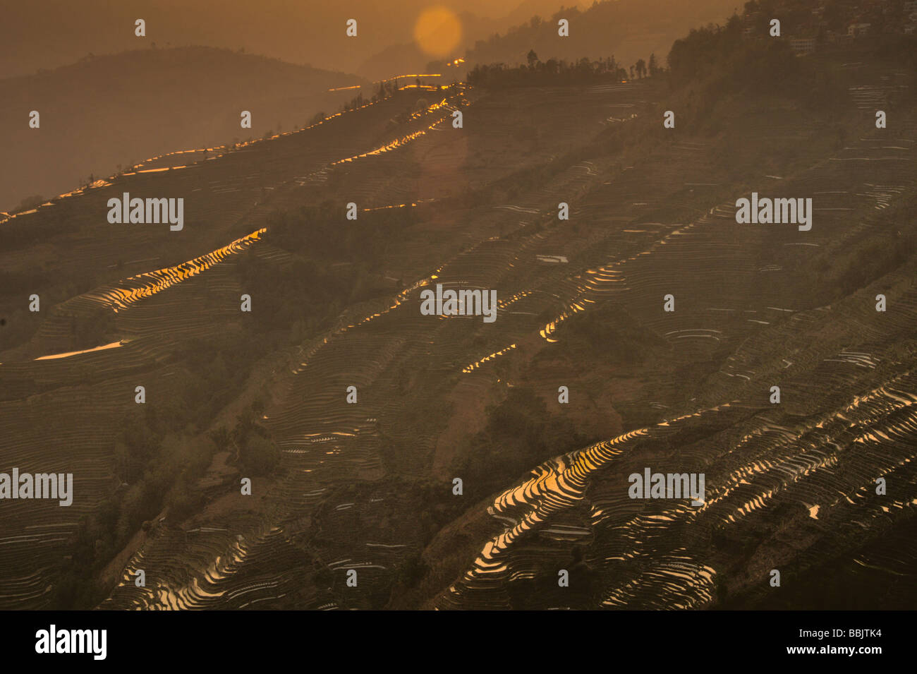 sunset at the magnificent tiger mouth rice terraces of Yuanyang in ...