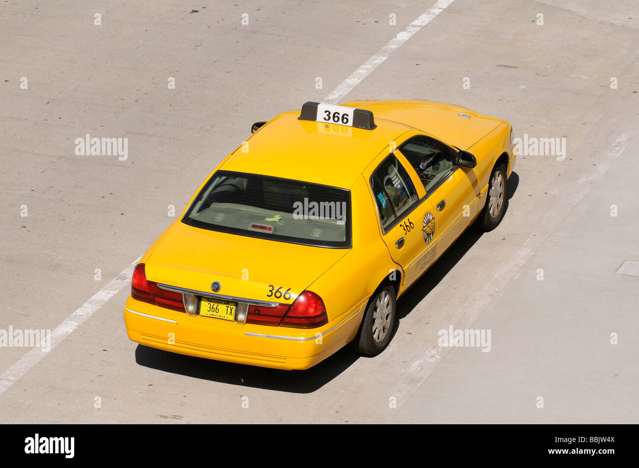Yellow cab driving in downtown Chicago Illinois USA Stock Photo - Alamy