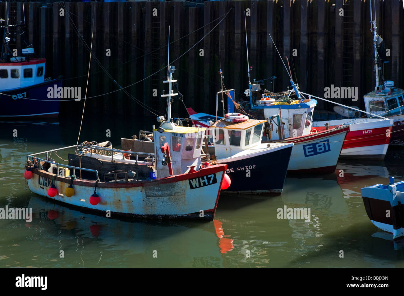 Local fishing boats in the harbour, Scarborough, East Coast, North ...