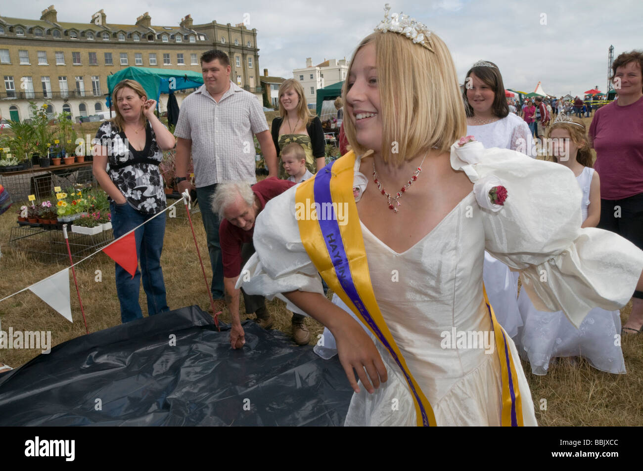Hayling Island Carnival Queen tries out a sideshow at the fair, Aug ...