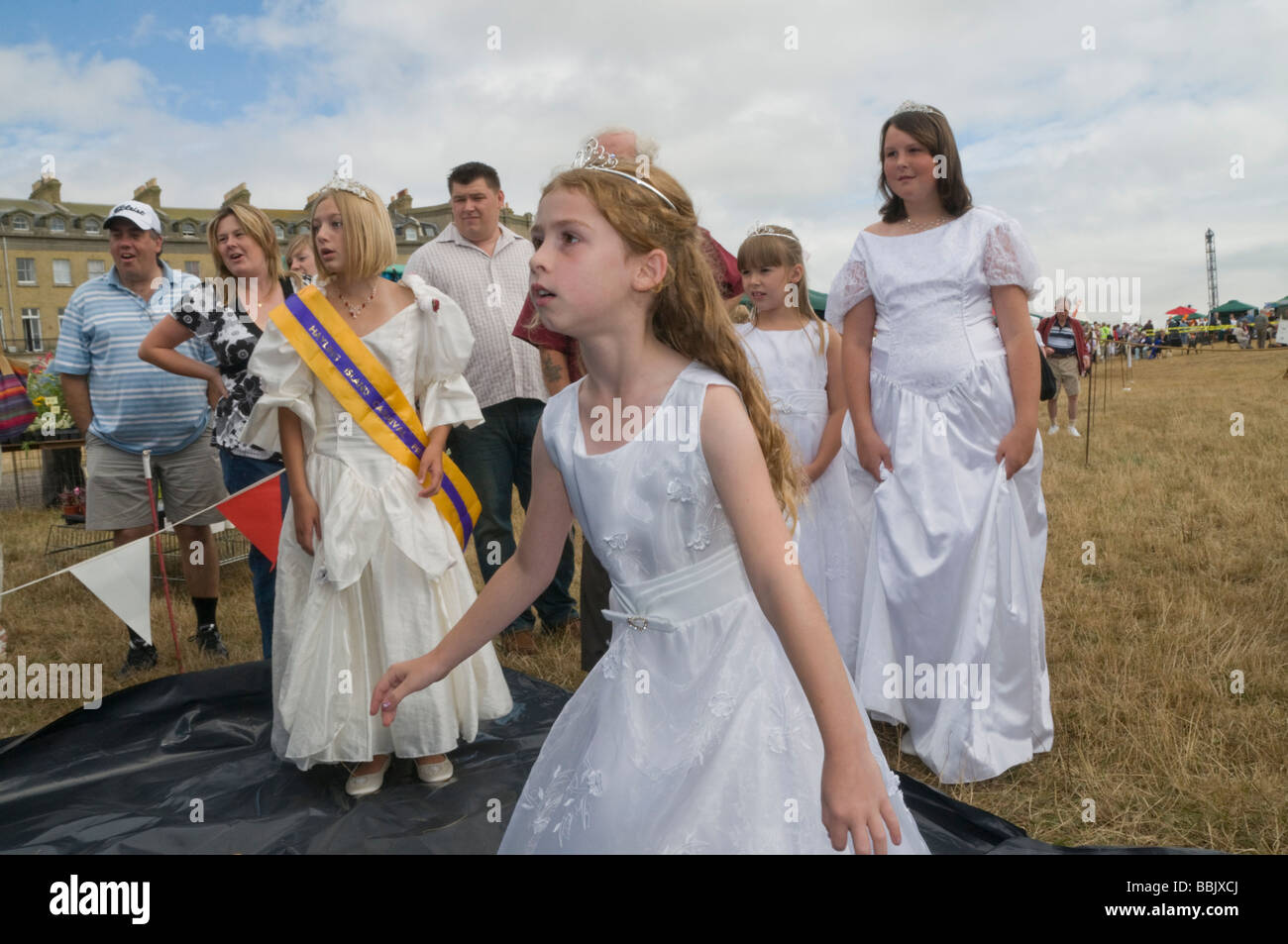 Queen and princesses go round the fair at the Hayling Island Carnival ...