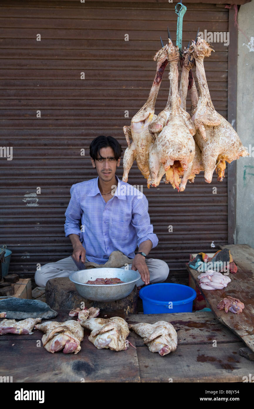 Indian man selling meat hi-res stock photography and images - Alamy