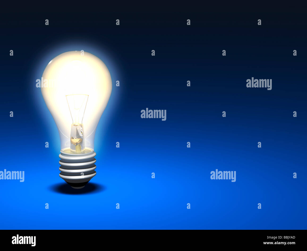 Glowing light bulb against a blue background Stock Photo - Alamy