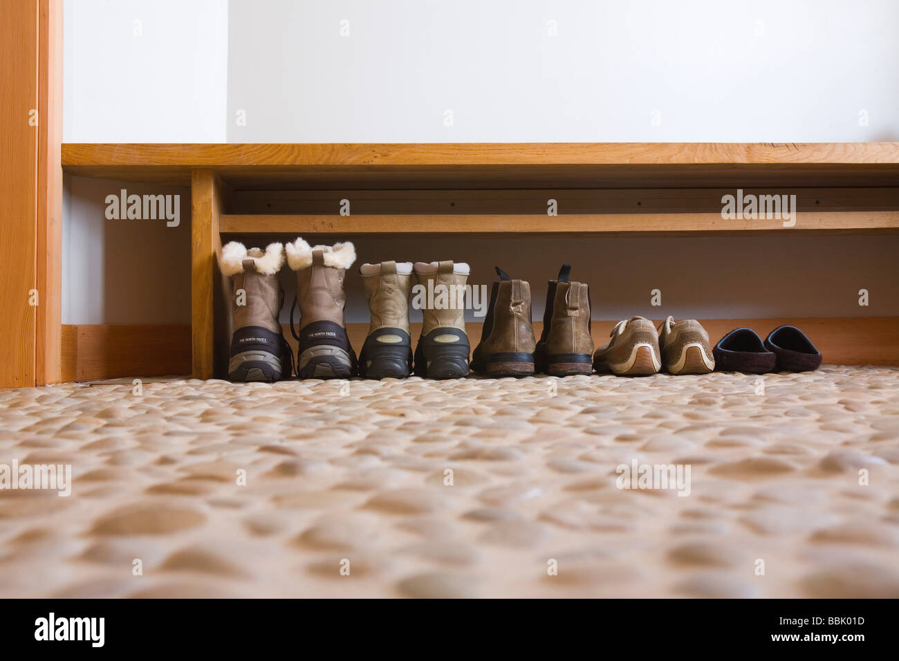 Row of shoes in house hi-res stock photography and images - Alamy