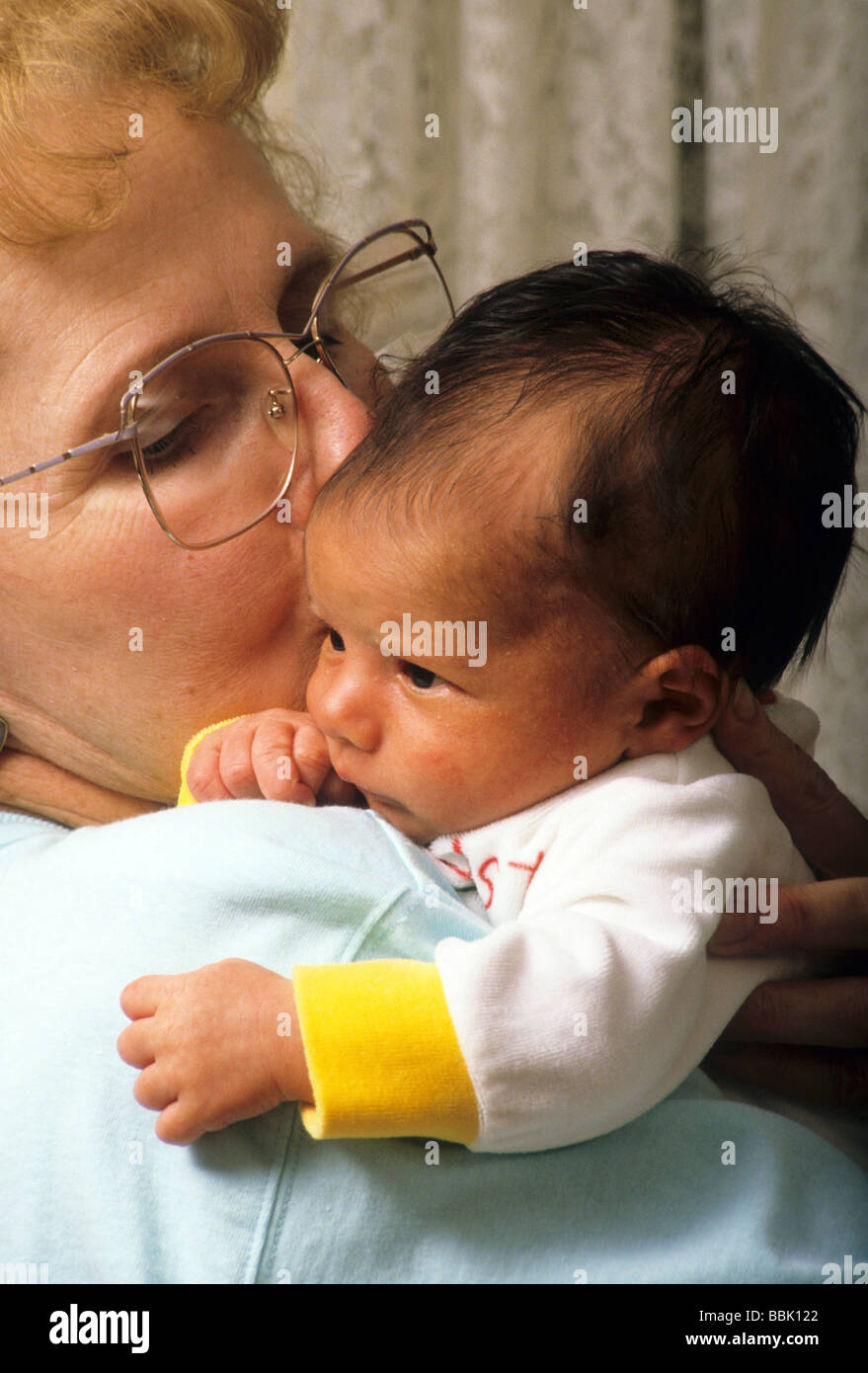 grandmother baby grandson love kiss care hug nurture cuddle Stock Photo ...