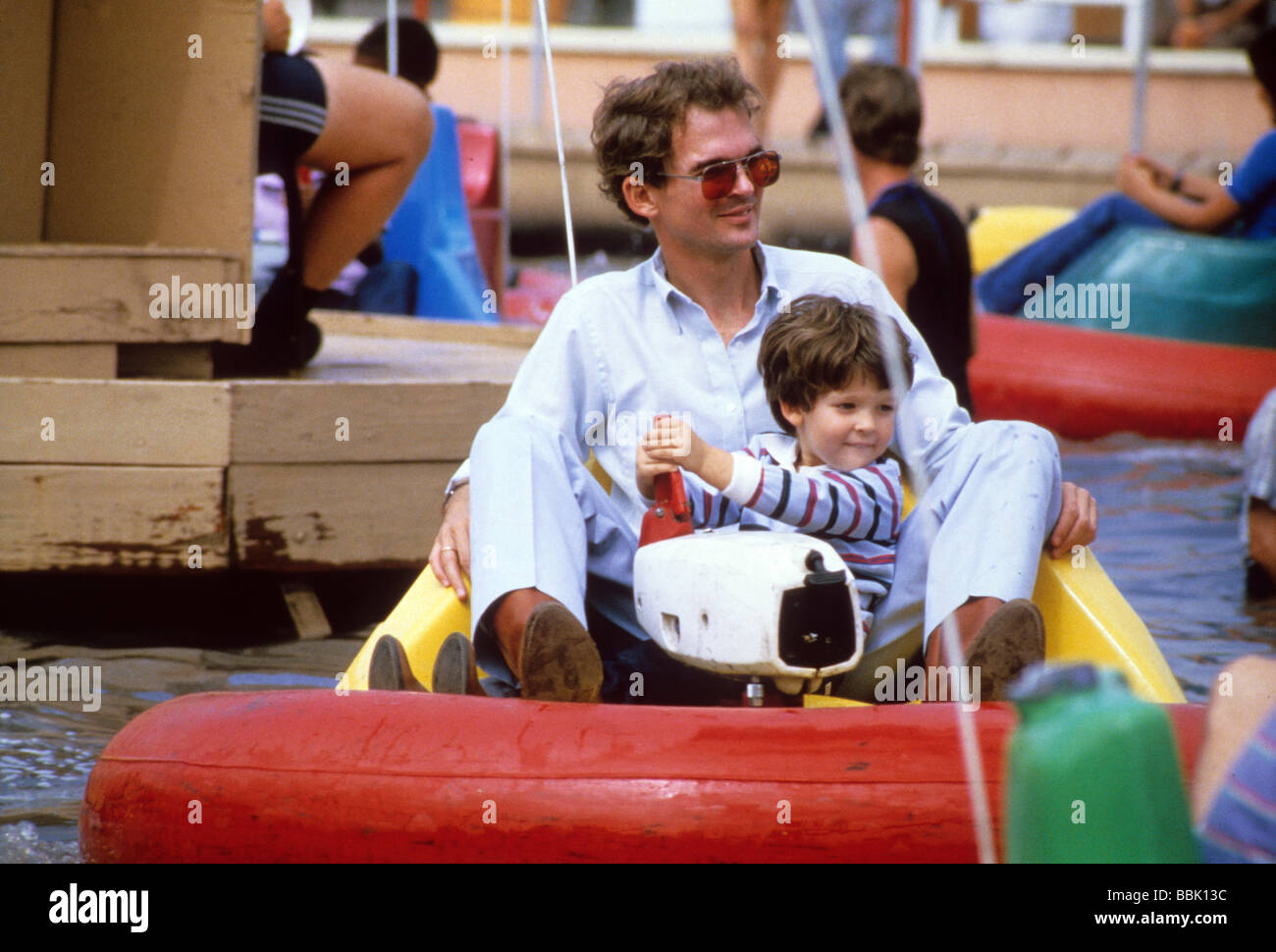 father son dad boy bumper boat ride carnival fun center fair festival ...