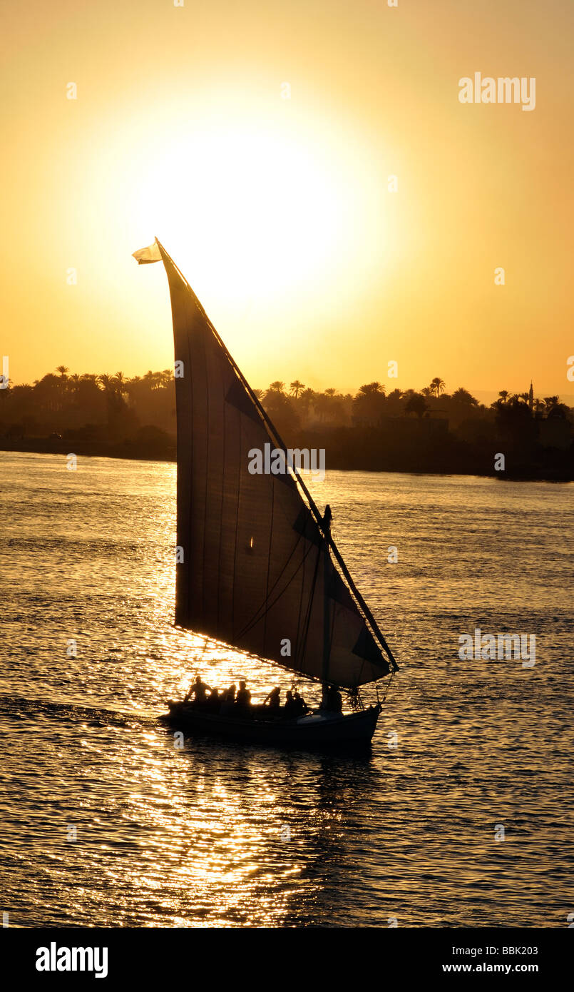 Traditional Egyptian Sailing Boat Felucca on River Nile at Sunset Luxor ...