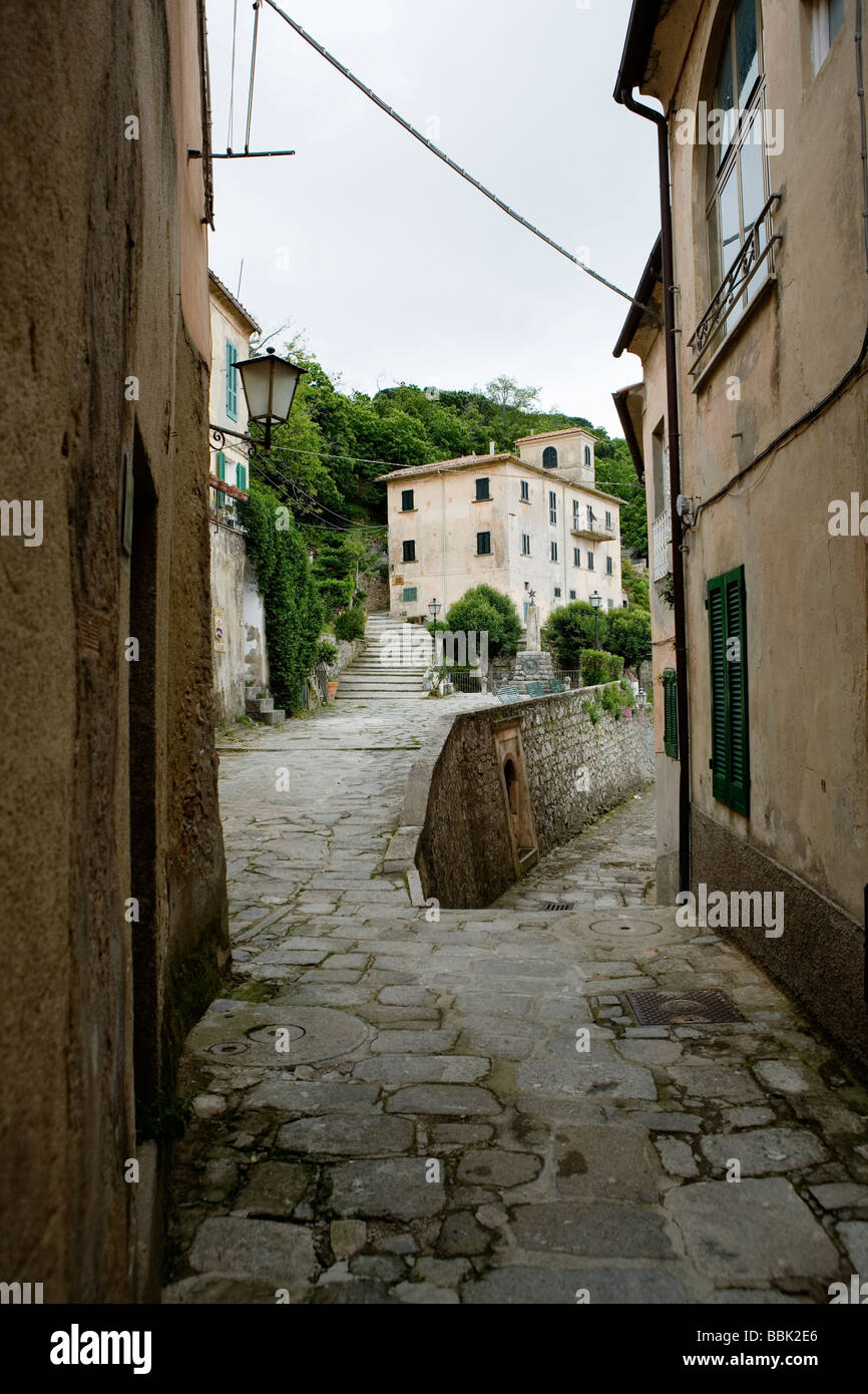 A narrow alley in ancient town of Marciana, Elba island, Italy Stock ...