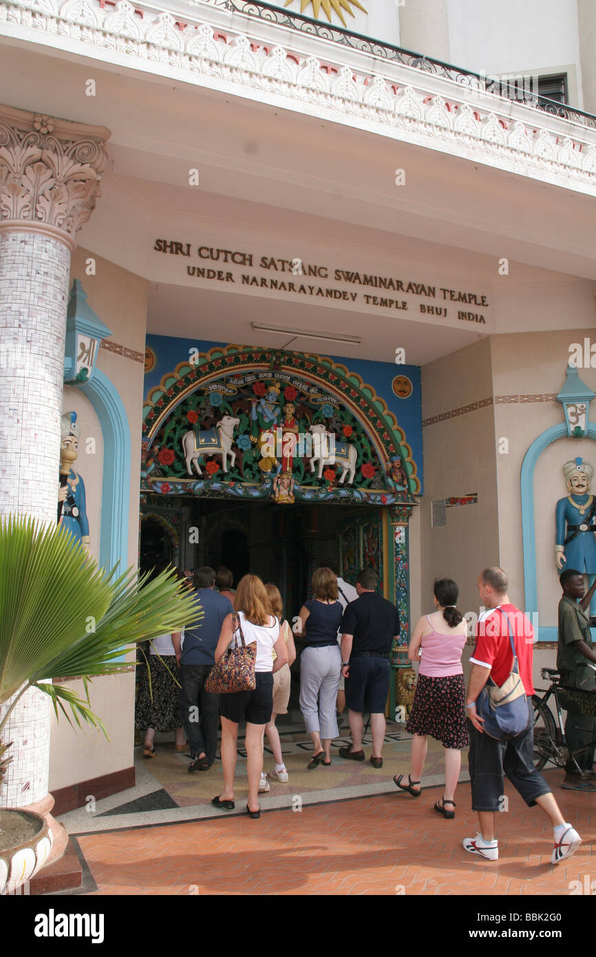 Tourists entering a Hindu temple in Mombasa Kenya Stock Photo - Alamy