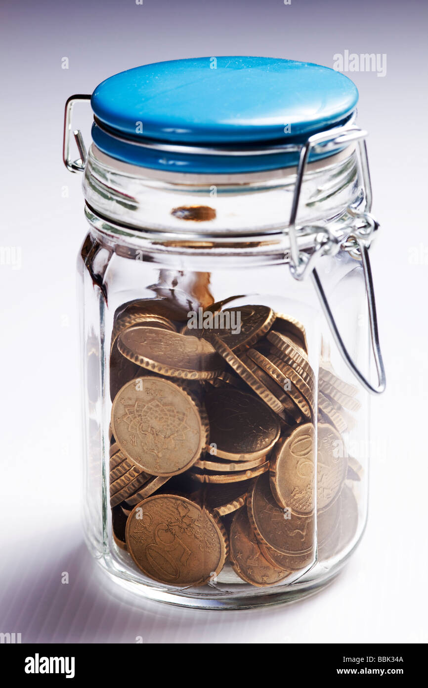 Pot of golden coins Stock Photo - Alamy