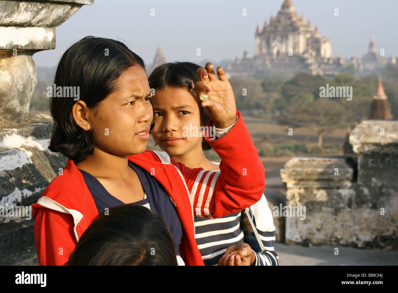 Burmese kids at Bagan eyeing up marbles, Myanmar (Burma Stock Photo - Alamy