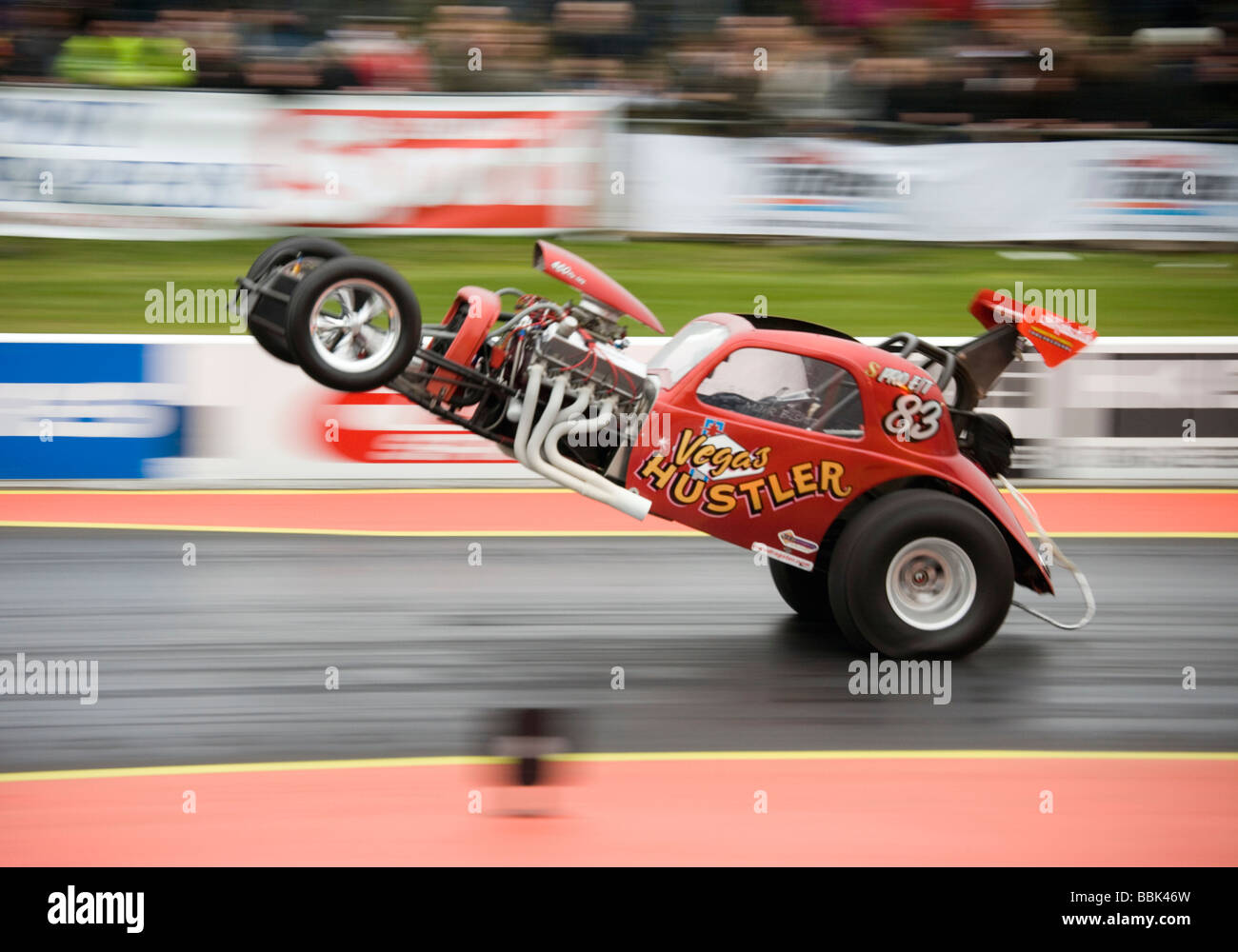 Super Pro ET dragster Vegas Hustler driven by Mark Bishop on 2 wheels ...