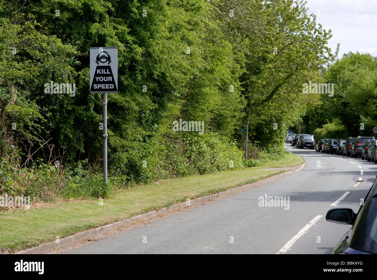 CHECK YOUR SPEED SIGN ON COUNTRY ROAD Stock Photo - Alamy