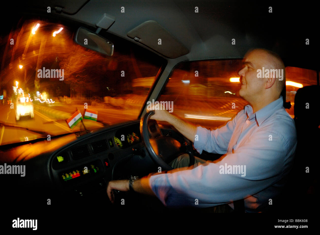 India, Tamil Nadu, Chennai (Madras). German business man in car driving ...