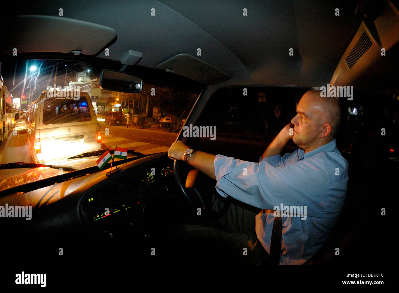 India, Tamil Nadu, Chennai (Madras). German business man in car driving ...