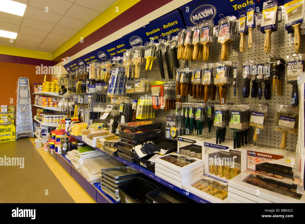 Interior of small decorating centre showing racks ofpaint stain tools ...