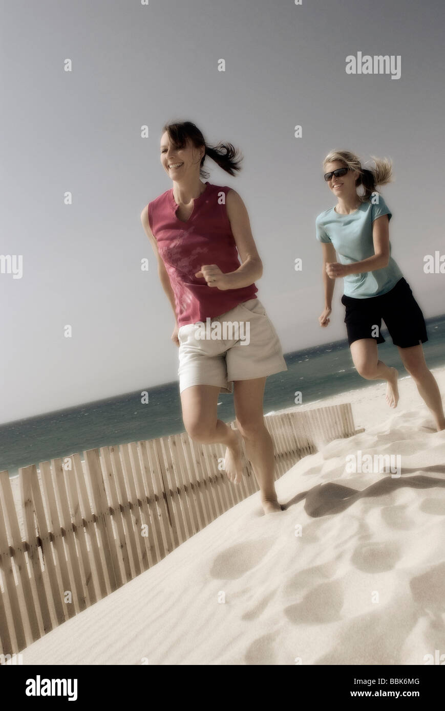 Girls running playfully hi-res stock photography and images - Alamy